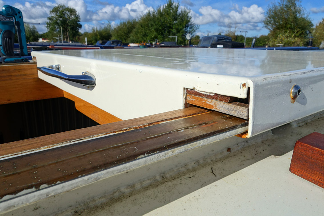 How to stop roof hatch from sliding closed? - Boat Building ...